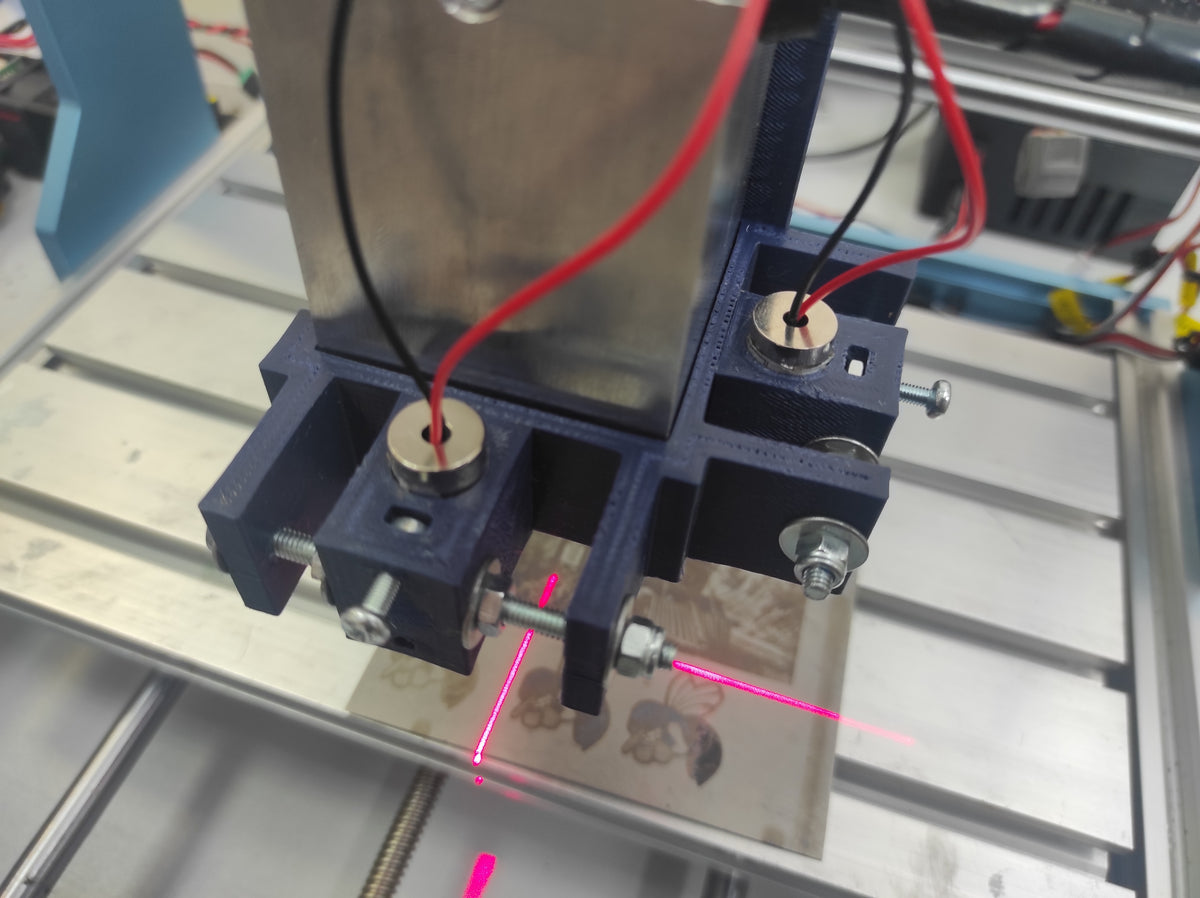 System for focusing and for determining the start of the laser positio ...